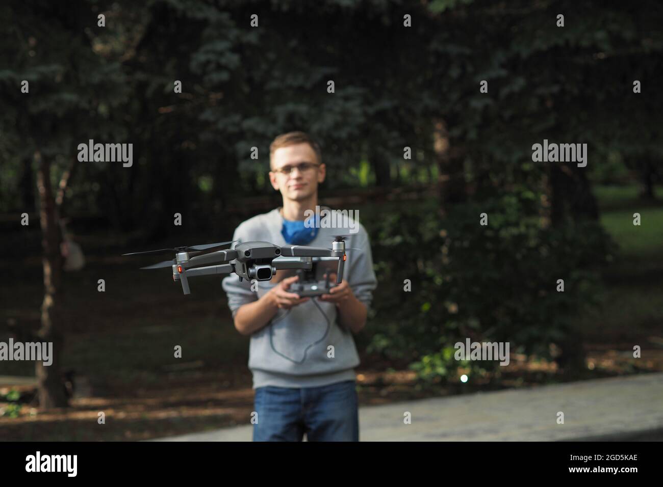 Drone pilot. Controlling the drone in the open air. High quality photo ...