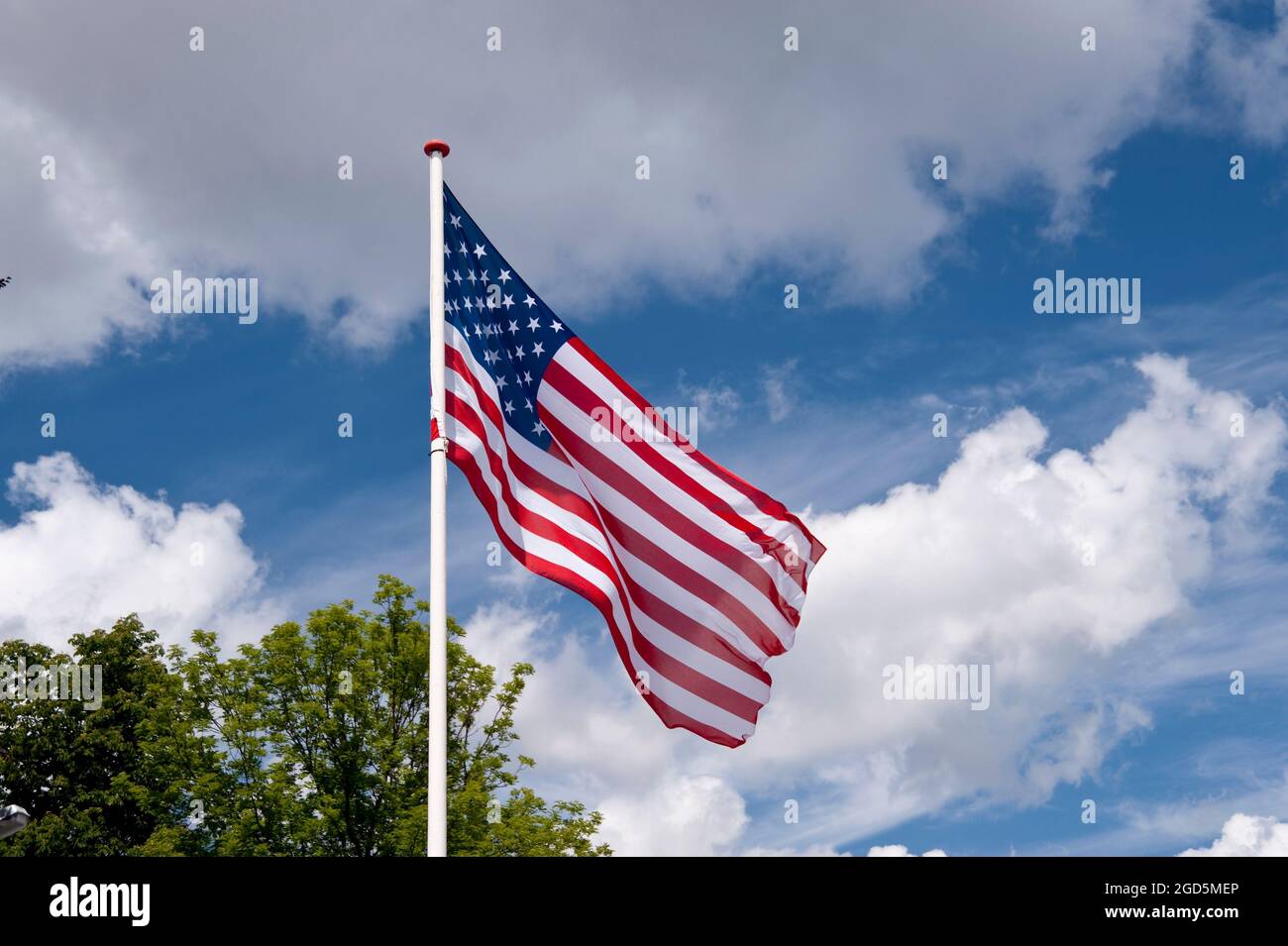 Flagpoles in front of united nations hi-res stock photography and ...