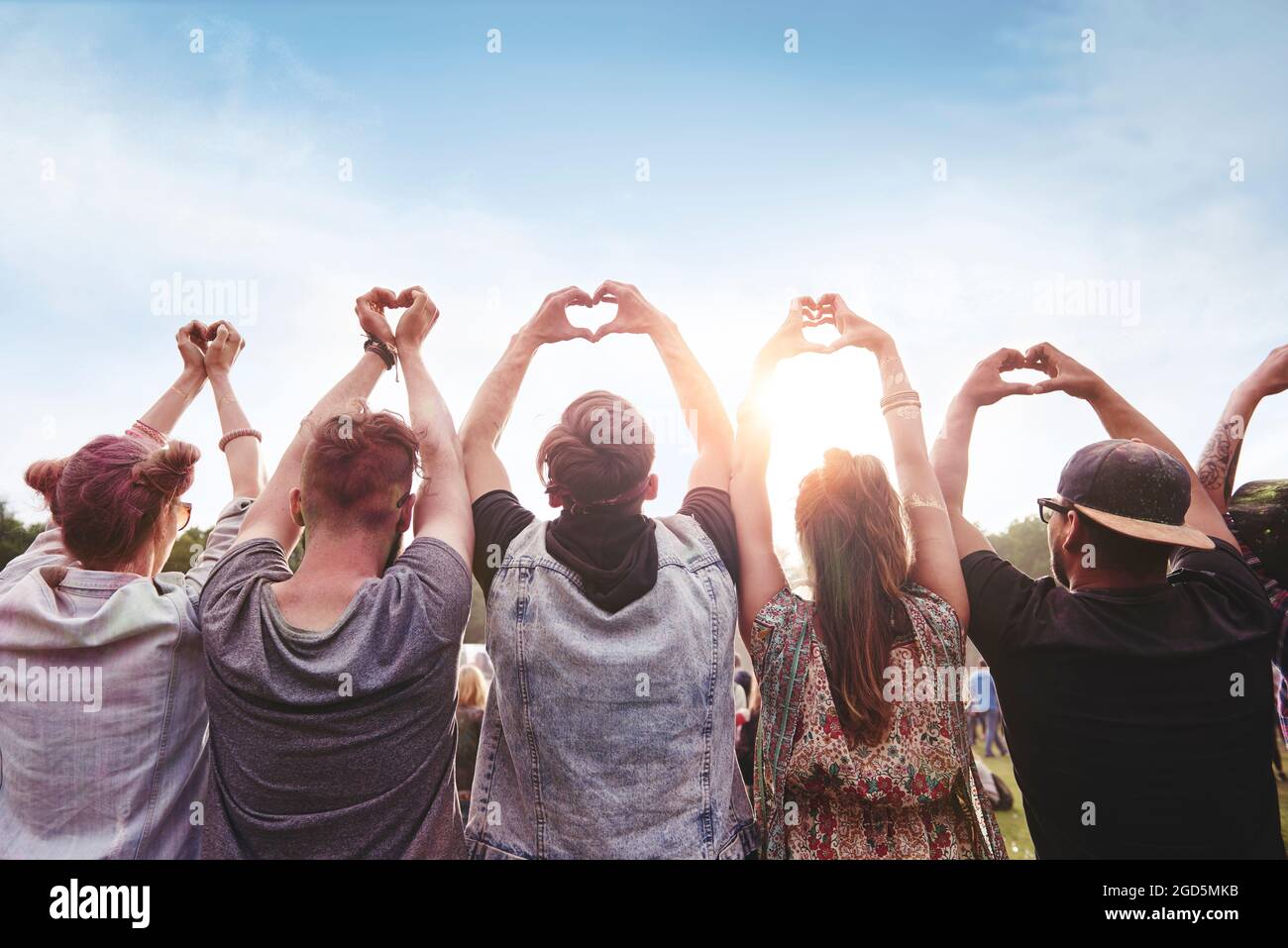 Group of people showing the heart shape Stock Photo - Alamy