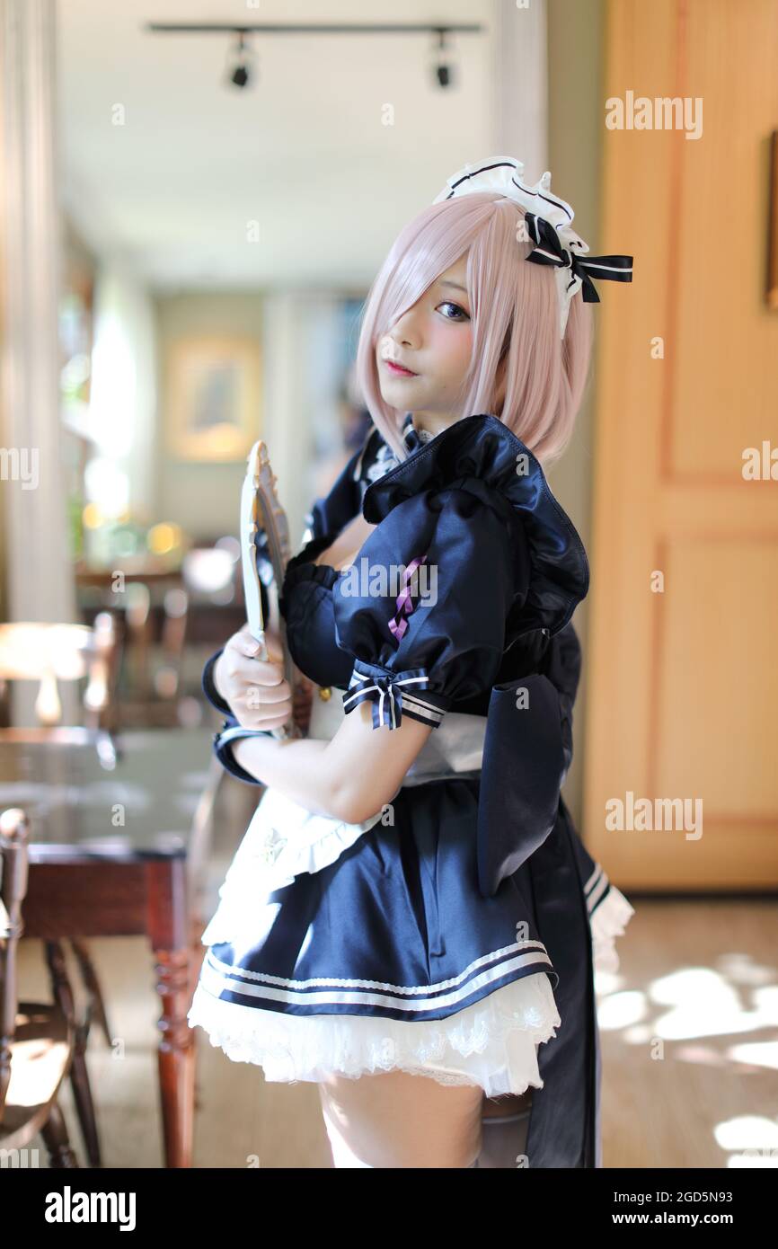 portrait of girl with japanese maid costume in vintage restaurant Stock ...