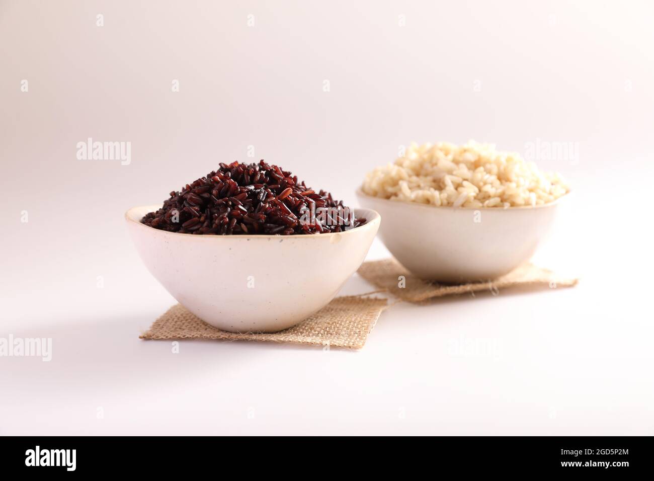 Organic boiled brown rice on bowl isolated in white background Stock ...