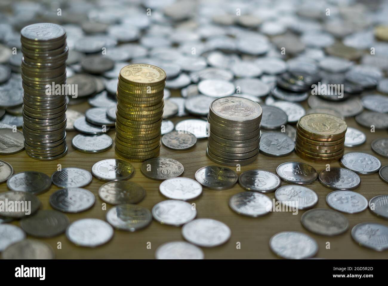 Scattered malaysian coins hi-res stock photography and images - Alamy