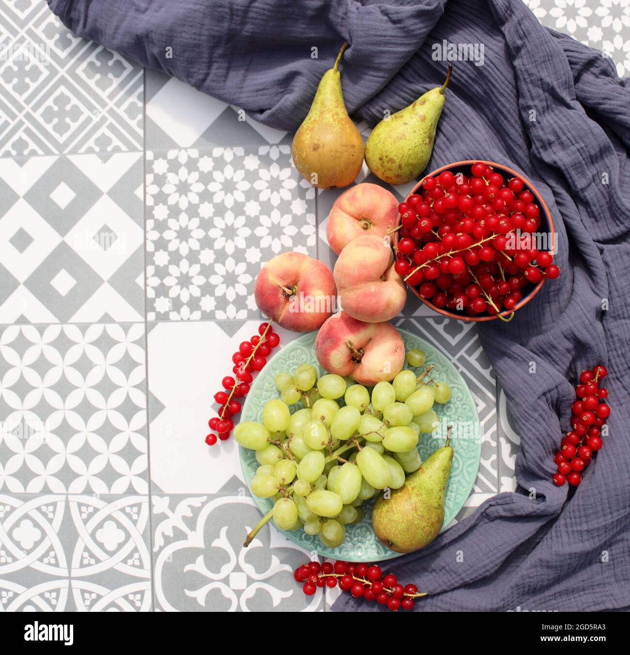 Still life with fruits and berries. Organic berries and fruits on a ...
