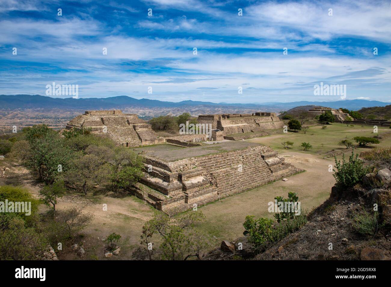 View of the ancient ruins of the Monte Albán pyramid complex in Oaxaca ...