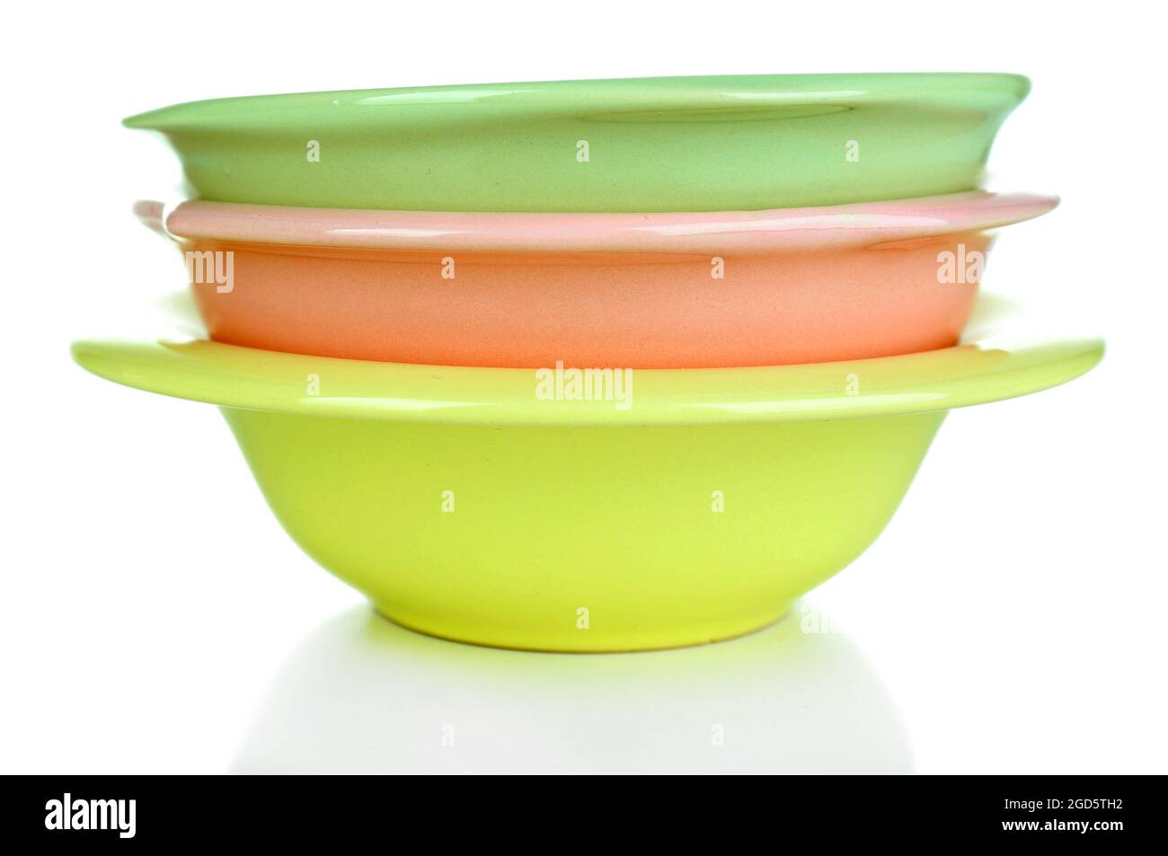 Colorful empty bowls isolated on white Stock Photo - Alamy