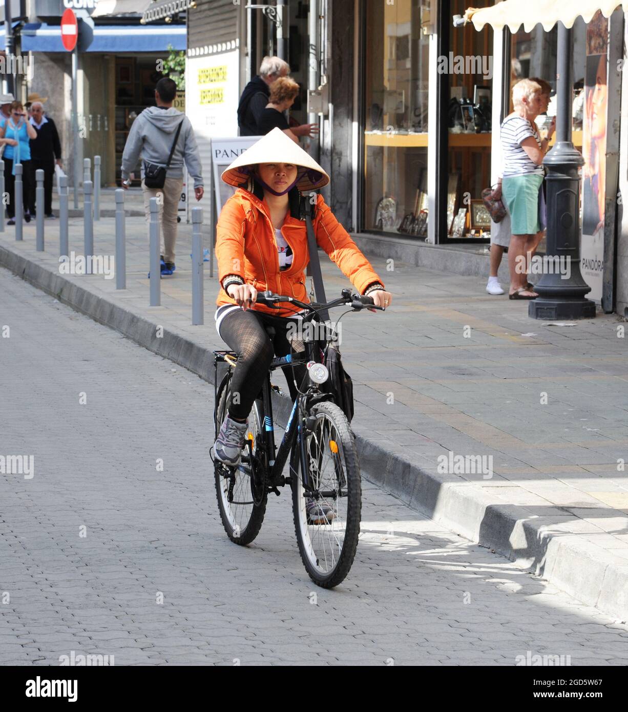 Oriental Lady on a Bicycle in Limassol Cyprus. © Photo by Richard ...