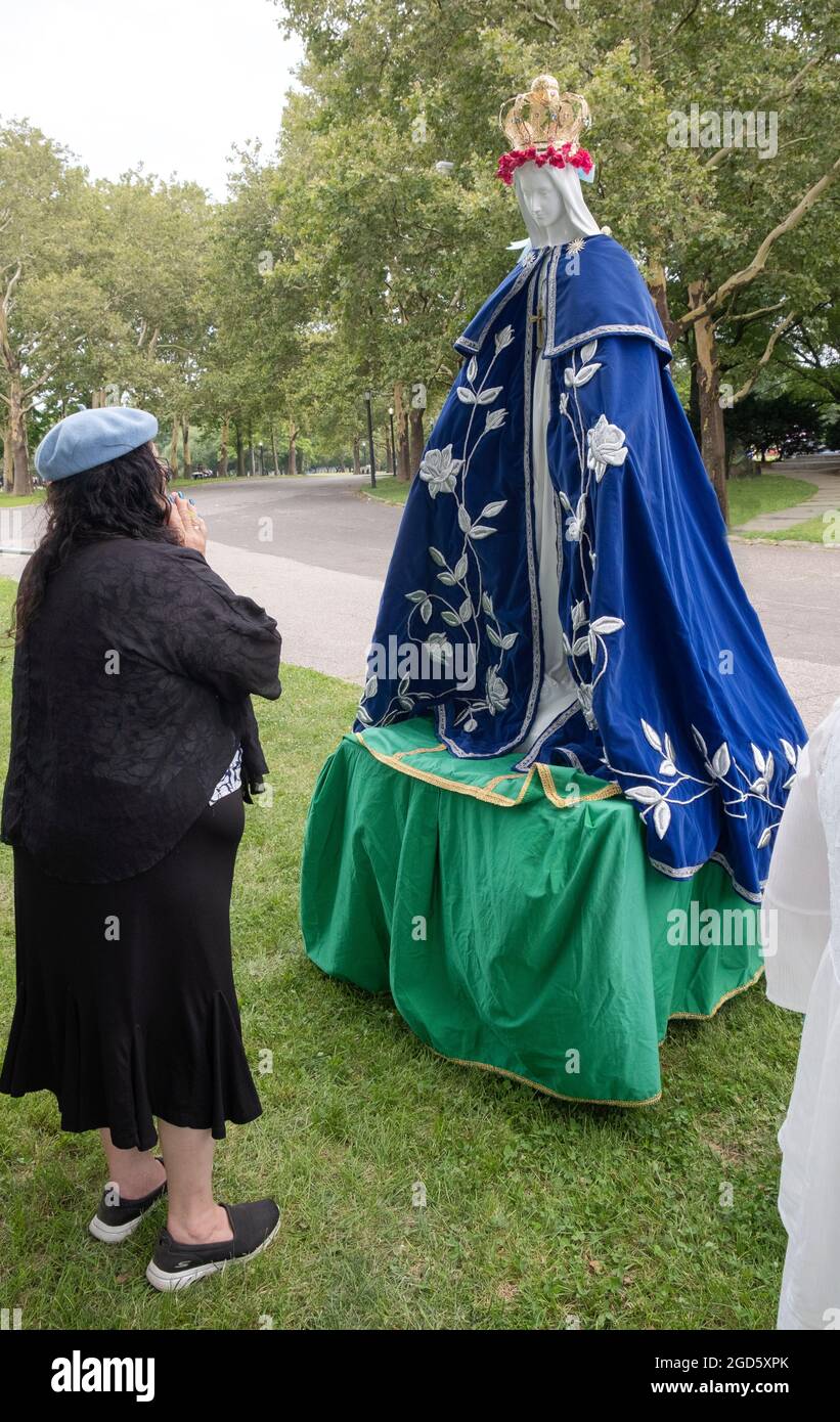 Devout Roman Catholic woman at a service near the Vatican Pavilion site ...