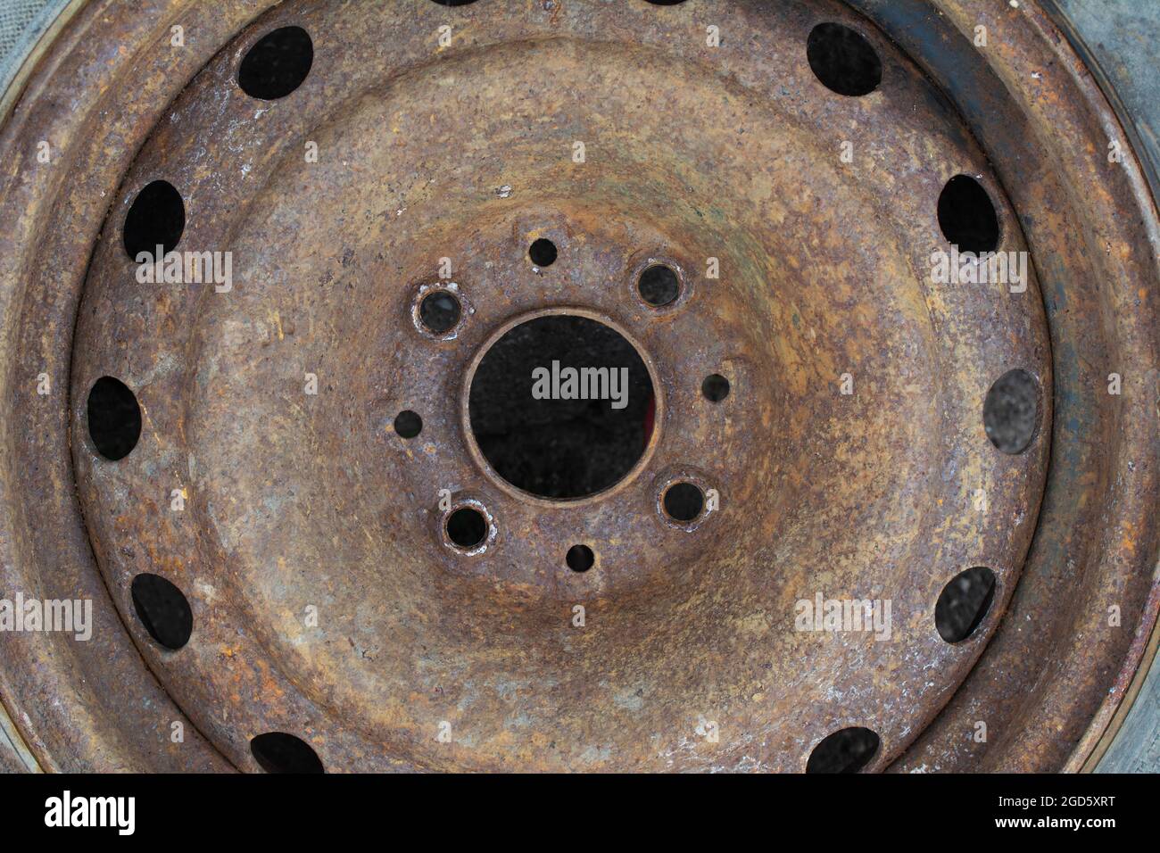 Old rusty car stamped wheel disc. Metal corrosion texture Stock Photo ...