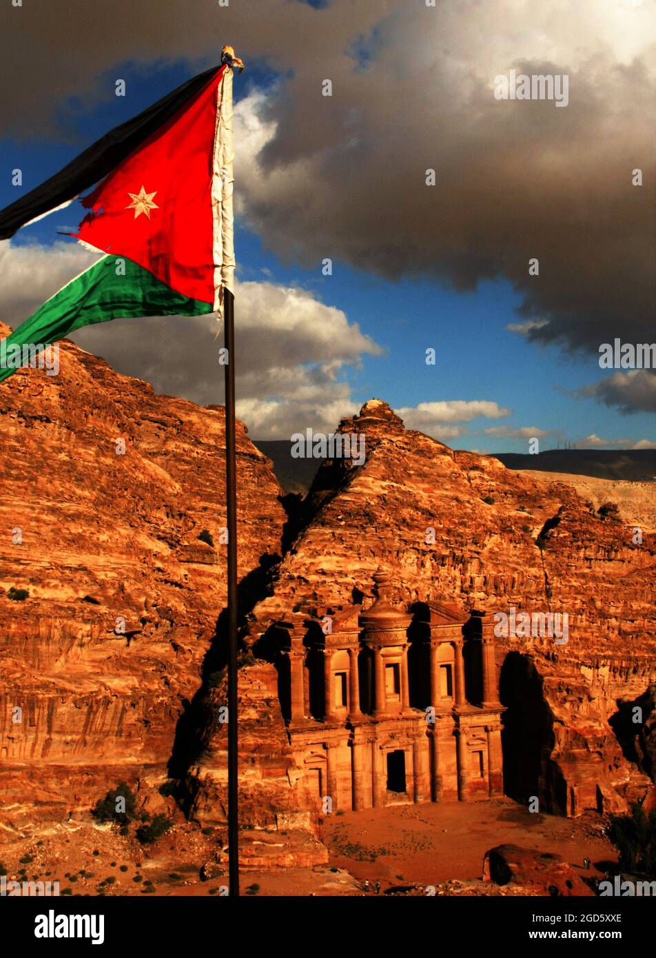 Flag of Jordan over the Petra Monastery Stock Photo - Alamy
