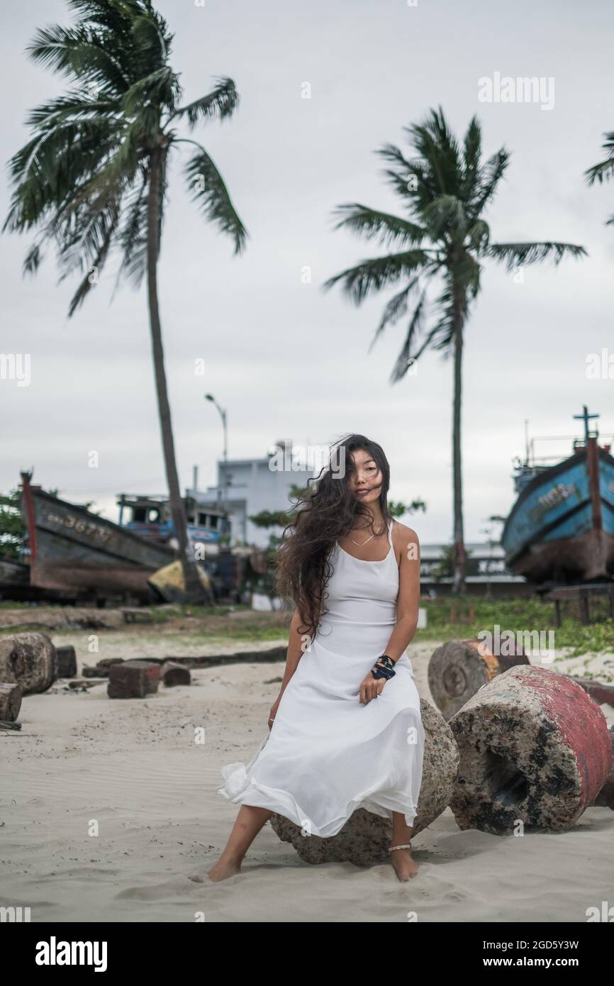 Woman windy day dress hi-res stock photography and images - Alamy