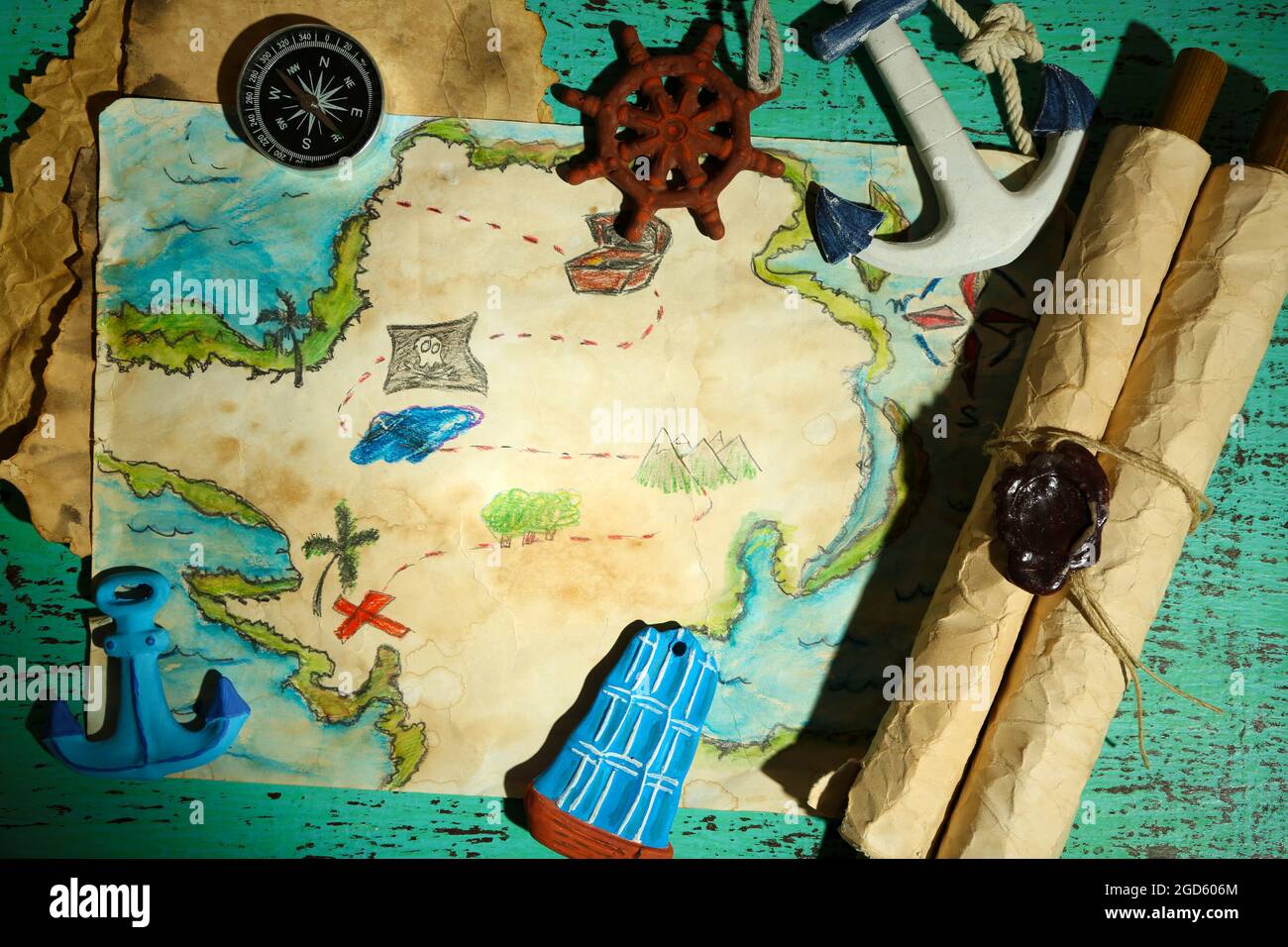 Treasure map with sea accessories, on wooden background Stock Photo - Alamy
