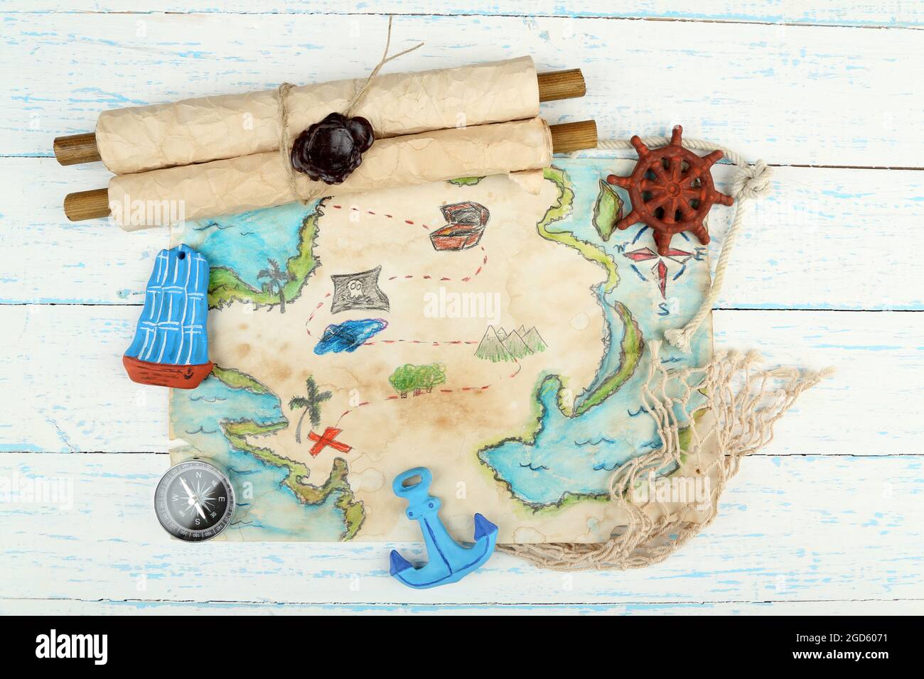 Treasure map with sea accessories, on wooden background Stock Photo - Alamy