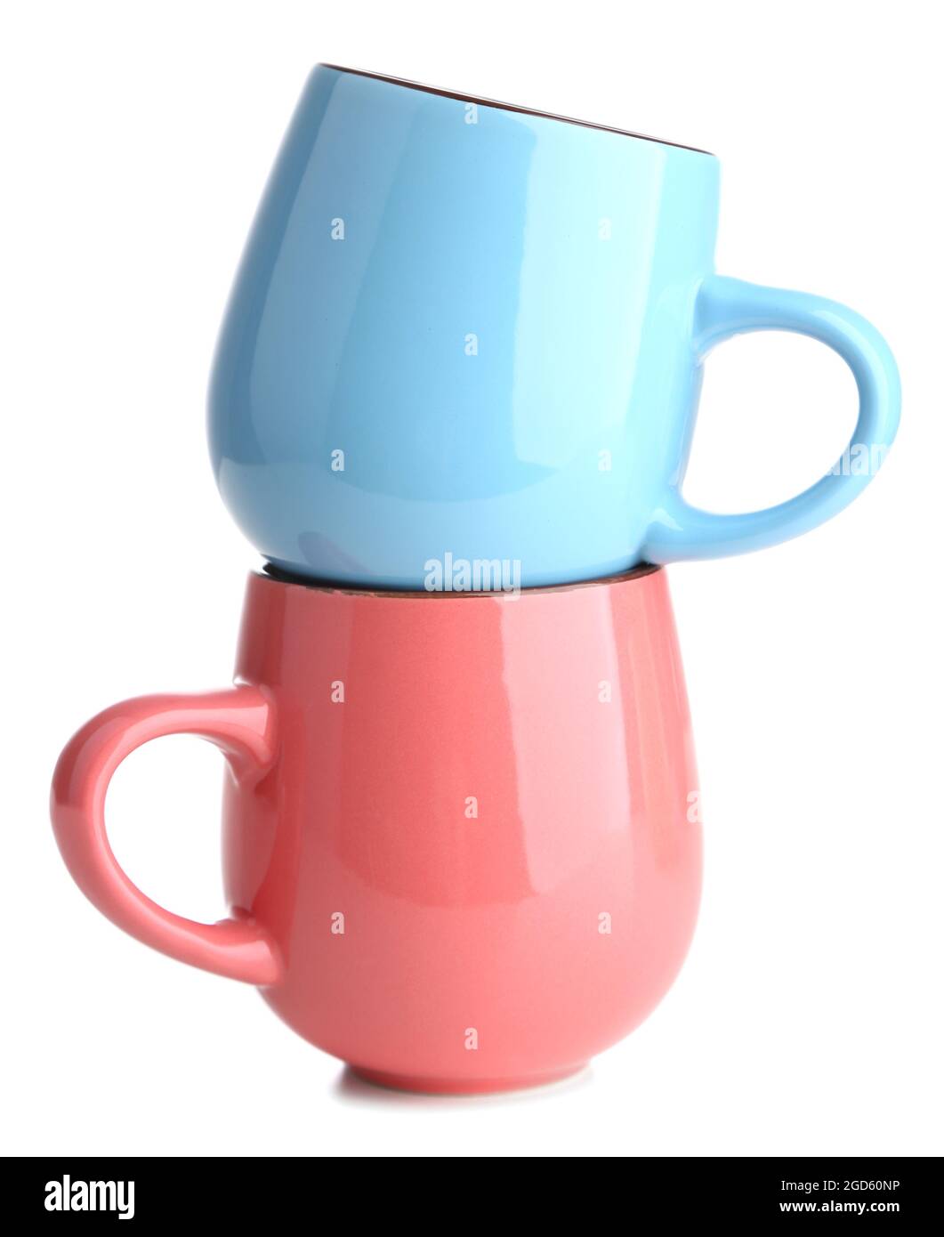 Blue and pink cups isolated on white Stock Photo - Alamy