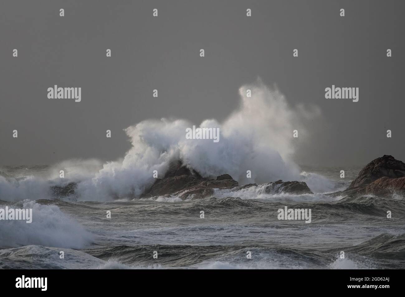 Storm on the coast seeing big wave breaking over rocks and cliffs ...
