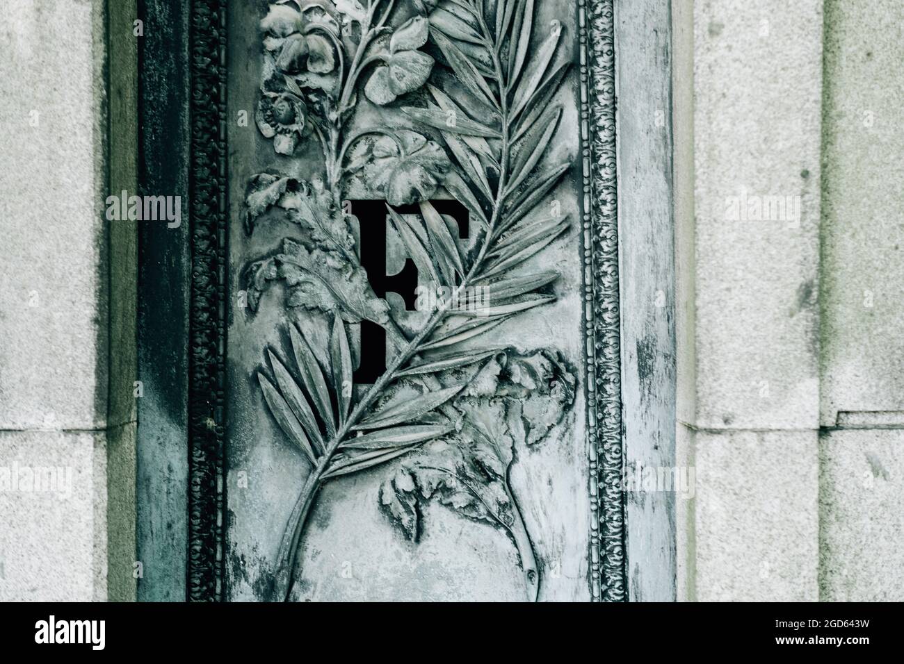 Bas relief sculpture with the letter "F Stock Photo - Alamy