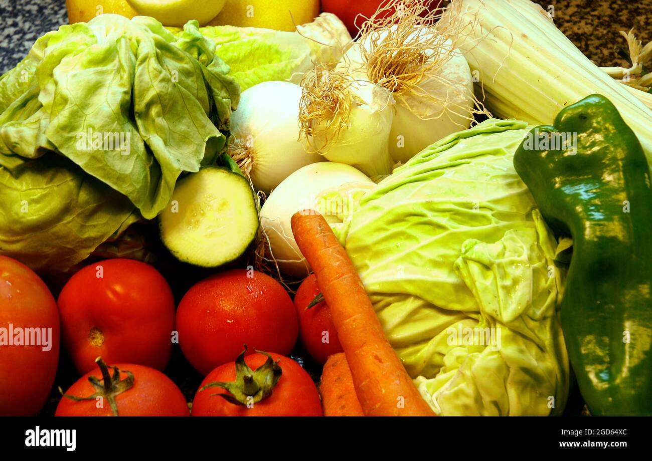 Fruits and vegetables on the kitchen marble Stock Photo - Alamy