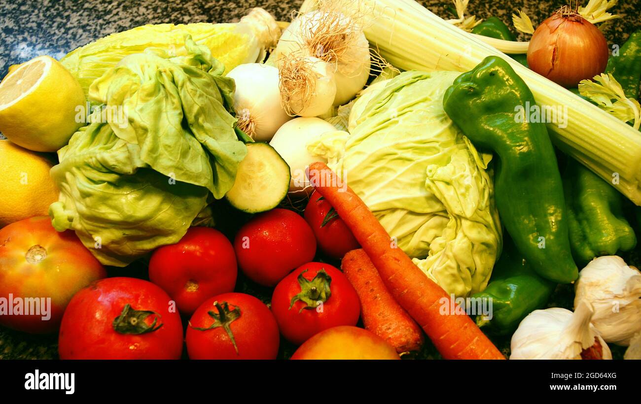 Fruits and vegetables on the kitchen marble Stock Photo - Alamy