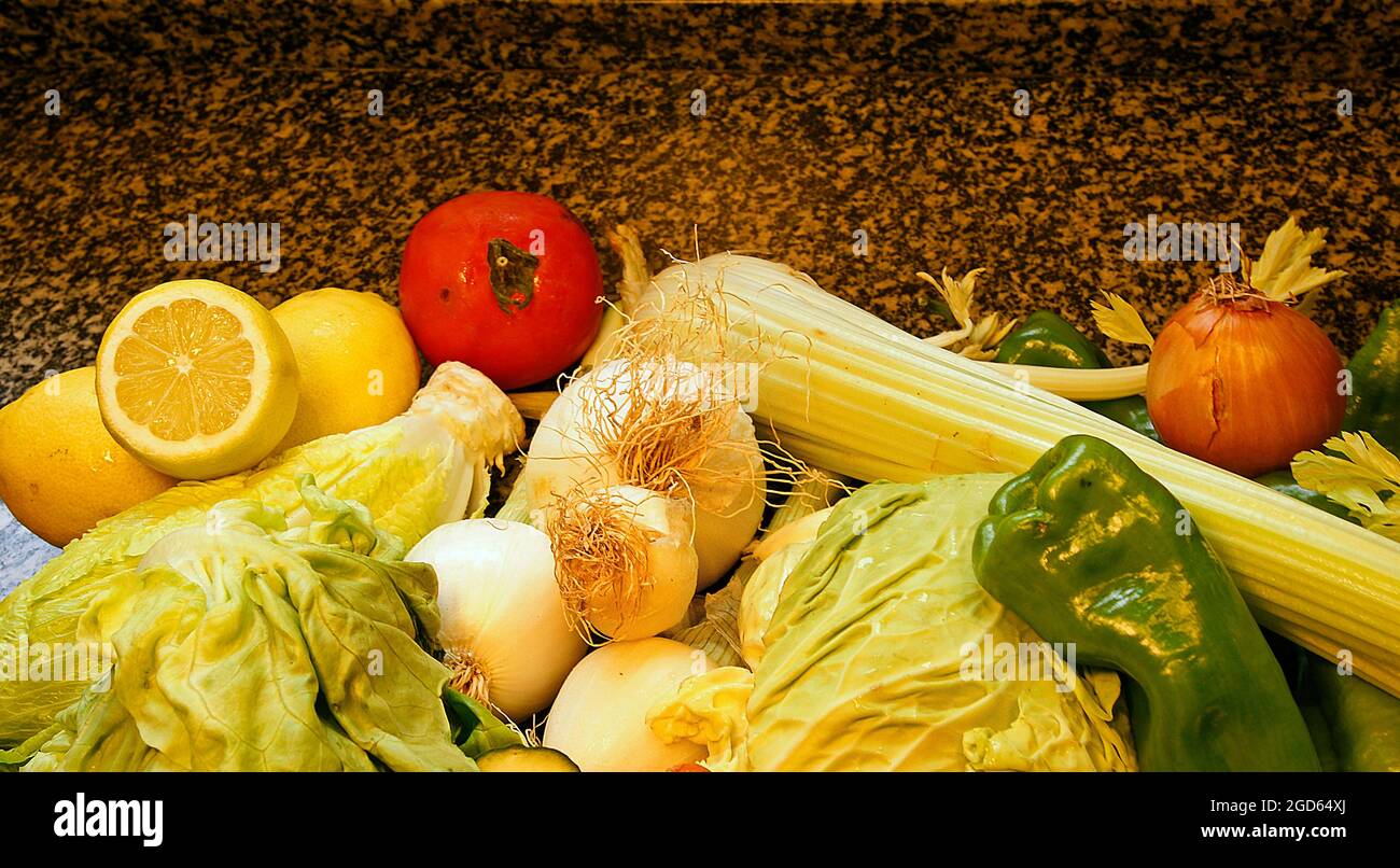 Fruits and vegetables on the kitchen marble Stock Photo - Alamy