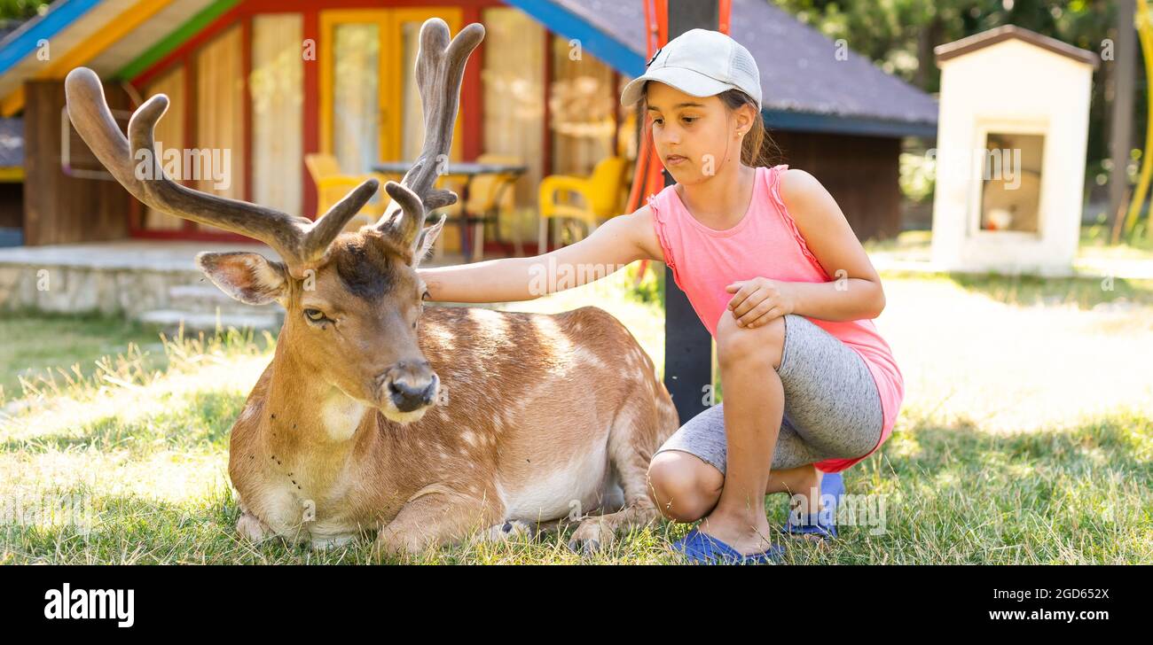 Girl Pet Deer