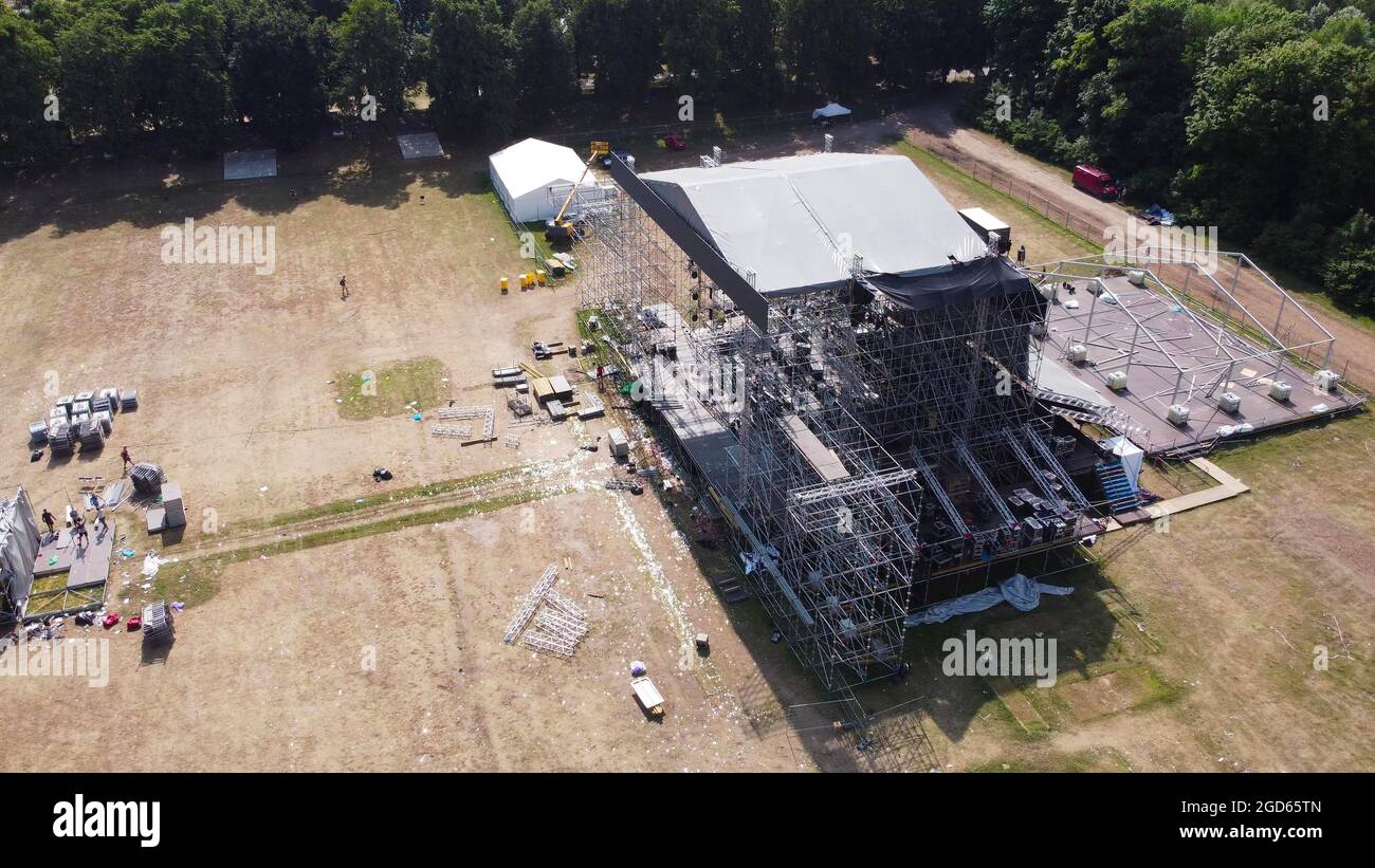 workers build a concert stage. Concept High-rise works. metal designs ...