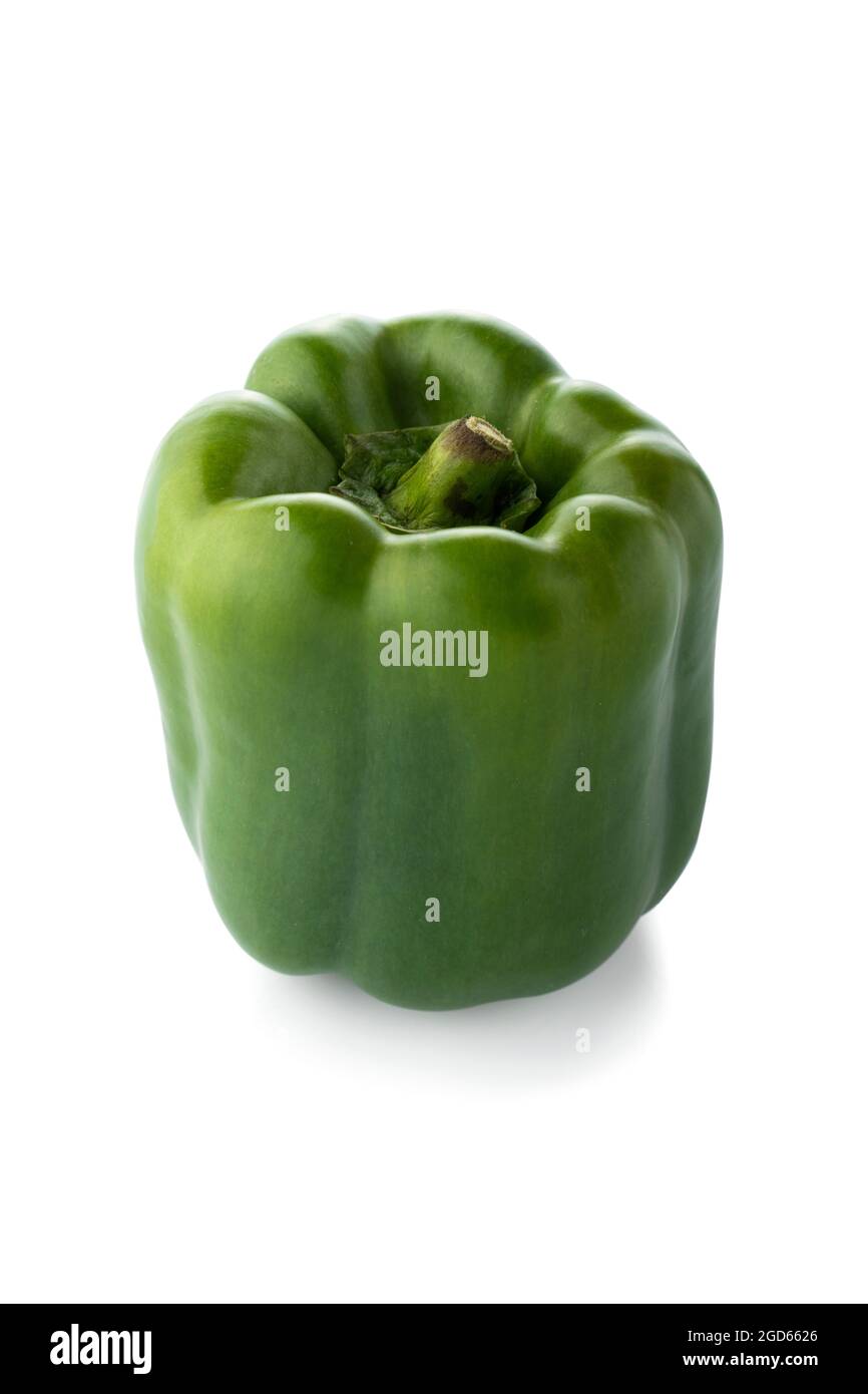 Green pepper, green paprika. Single pepper from the top on a white ...