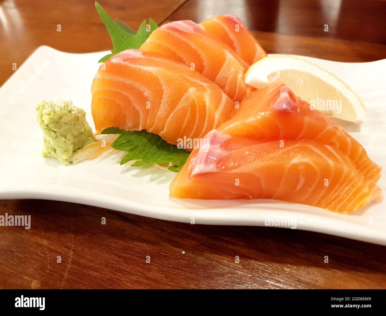 Fresh salmon sashimi with wasabi Stock Photo - Alamy