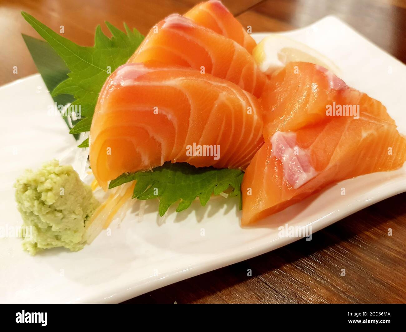 Sliced salmon sashimi, Japanese raw food delicious menu Stock Photo - Alamy