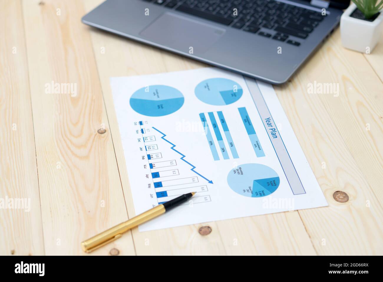 Office workplace with pc, charts Stock Photo - Alamy
