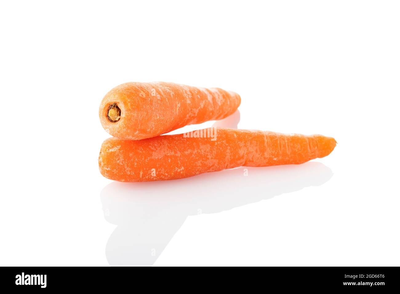 Carrot. Two carrot on a white background Stock Photo - Alamy
