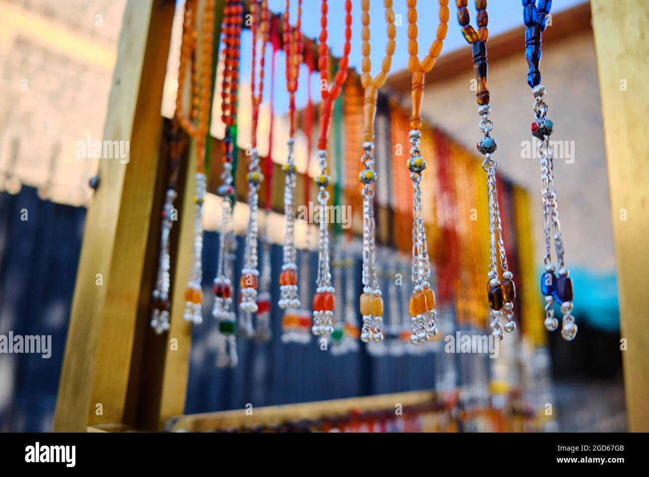 Rosary beads hanging at middle eastern bazaar Stock Photo - Alamy