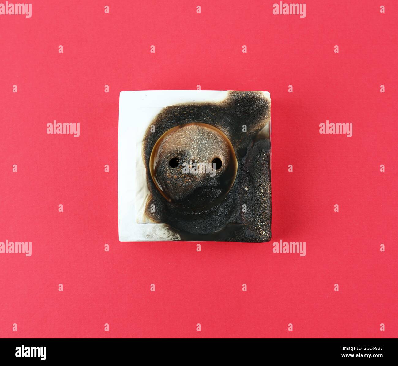 Burned plug socket close up Stock Photo - Alamy