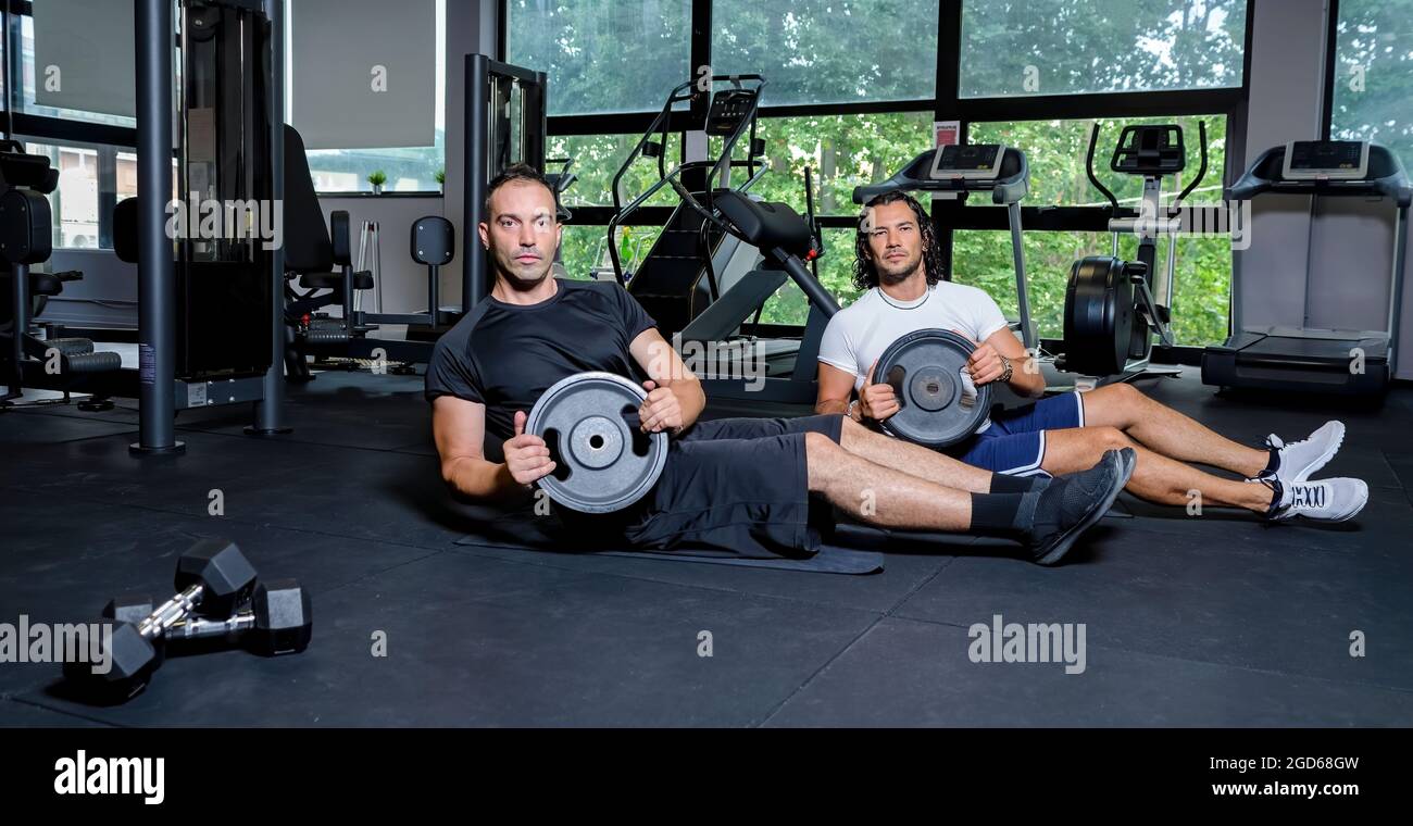 Two men sitting in train hi-res stock photography and images - Alamy