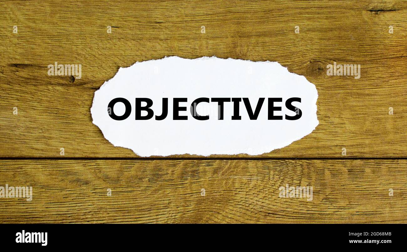 Objectives symbol. The concept word 'Objectives' on white paper ...