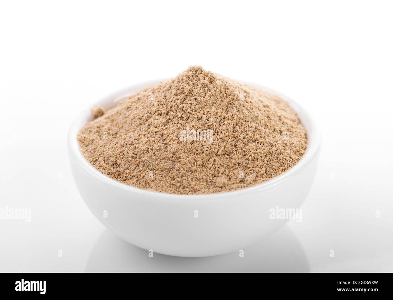 Cardamom powder. Cardamom powder in white bowl, on white background ...