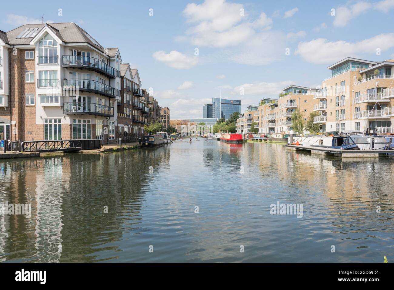 A distant Glaxo Smith Kline head office building near the River Brent ...