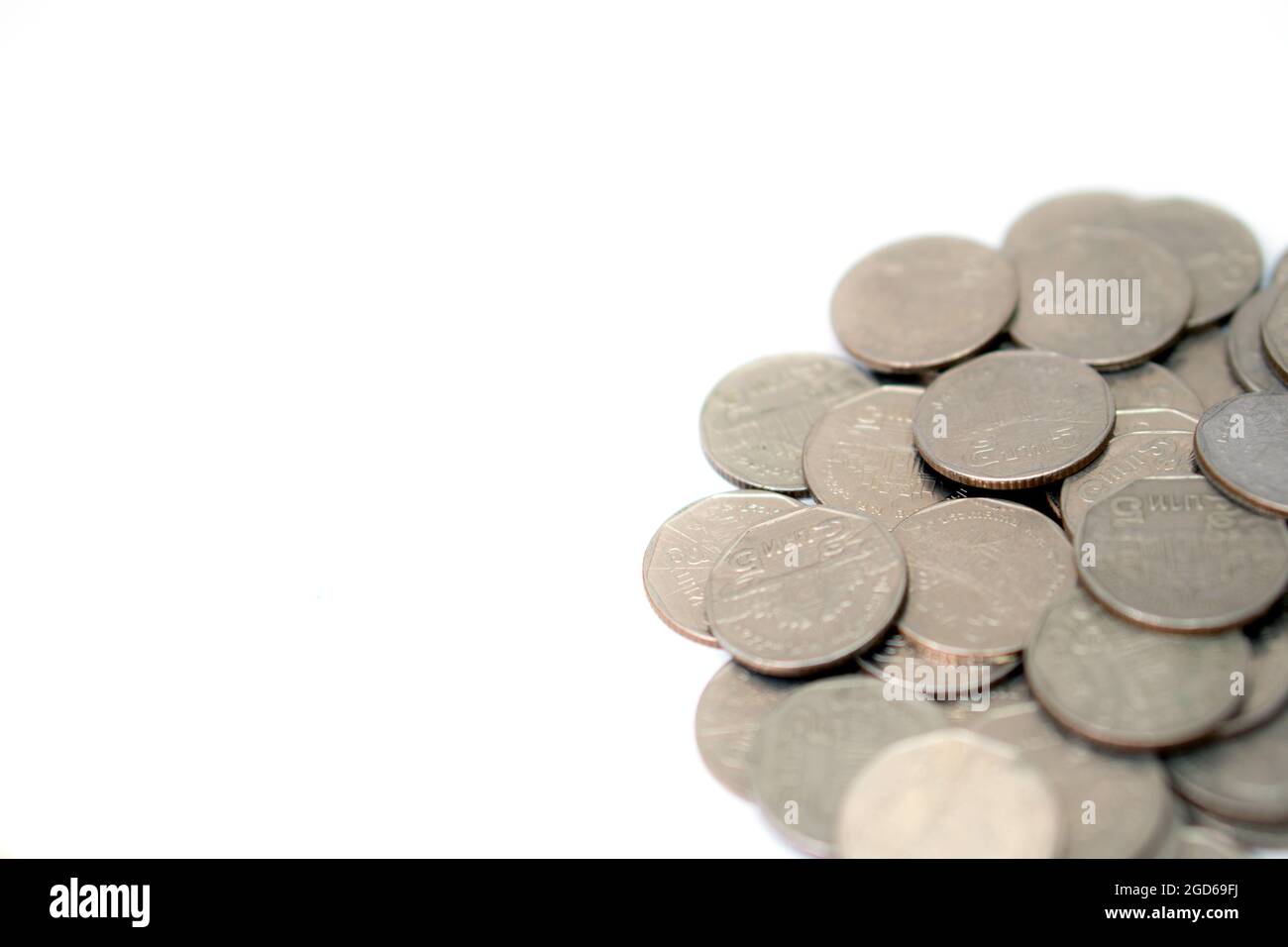 Stacks of coins isolated on white background Stock Photo - Alamy