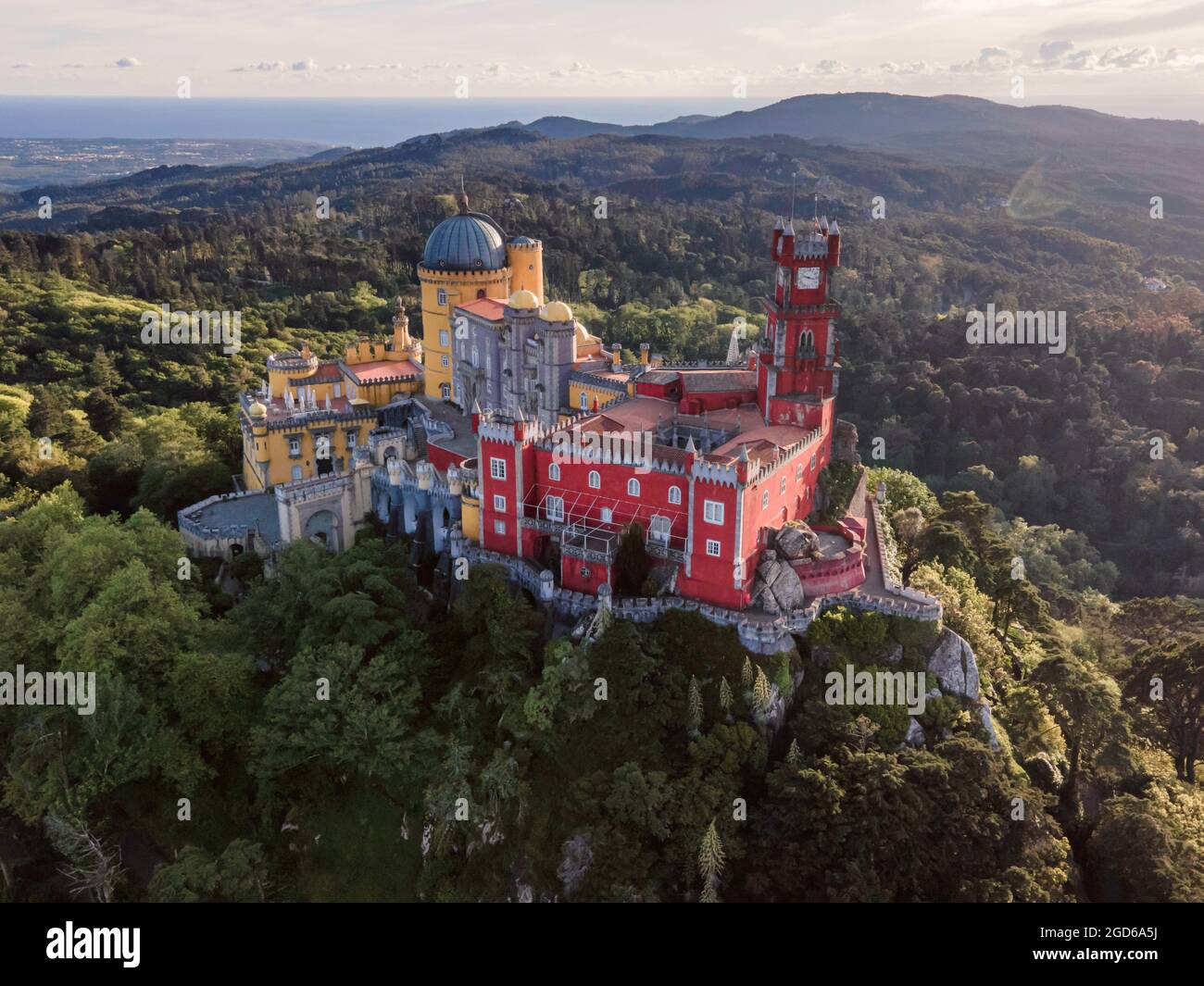 Aerial view of Pena Palace, a colorful castle building on hilltop at ...