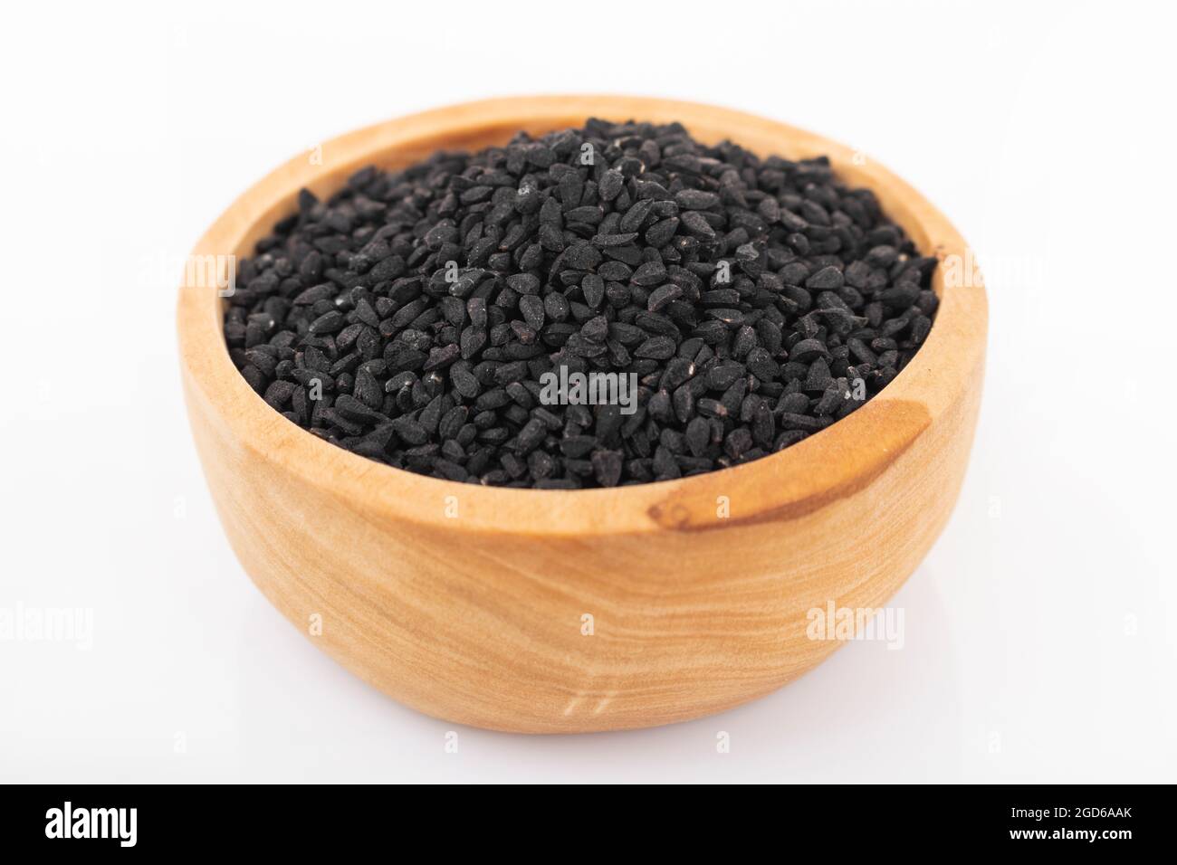 Black cumin seeds. Black cumin in white wooden on white background ...