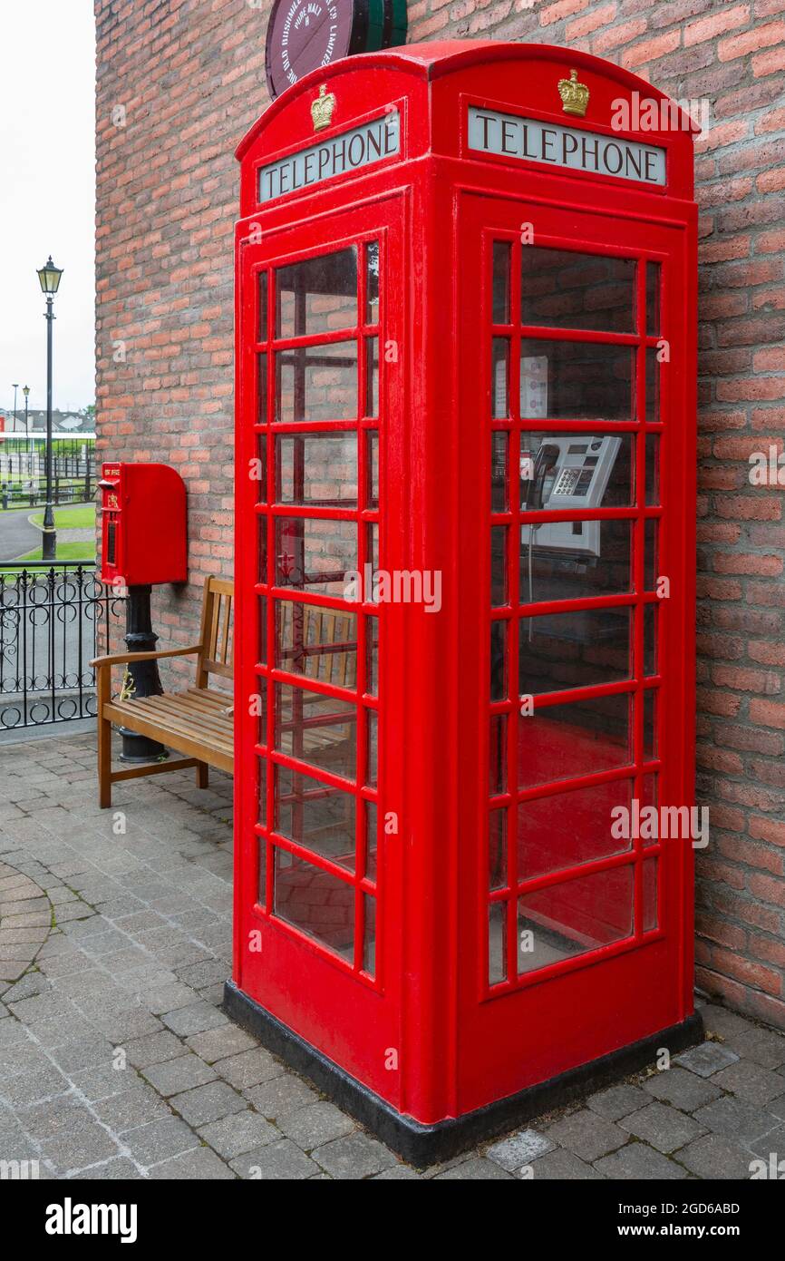 British syle red telephone box outside the Bushmills Distillery in ...