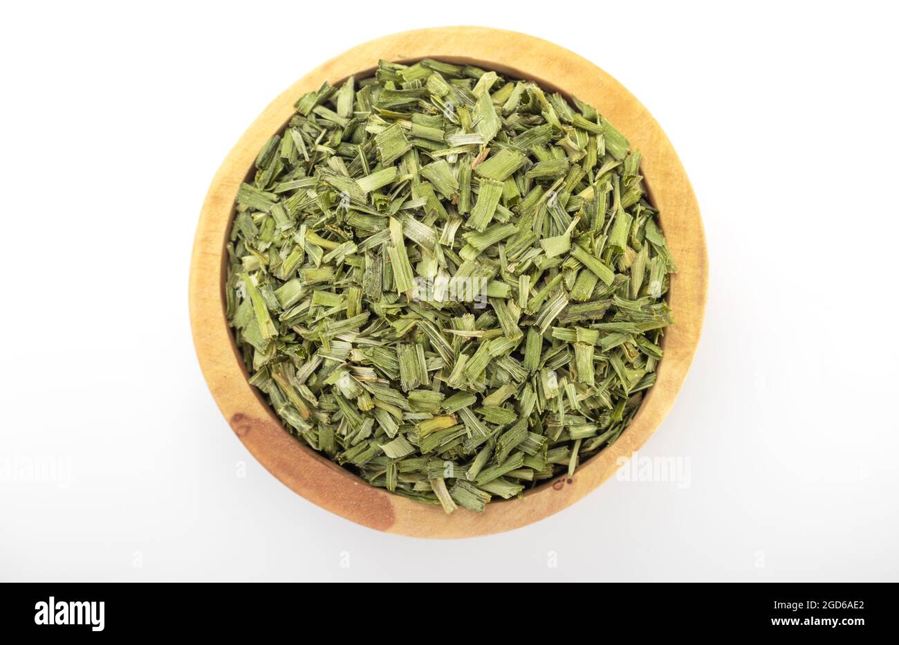 dry chopped spring onion in wooden bowl on white background. dry ...