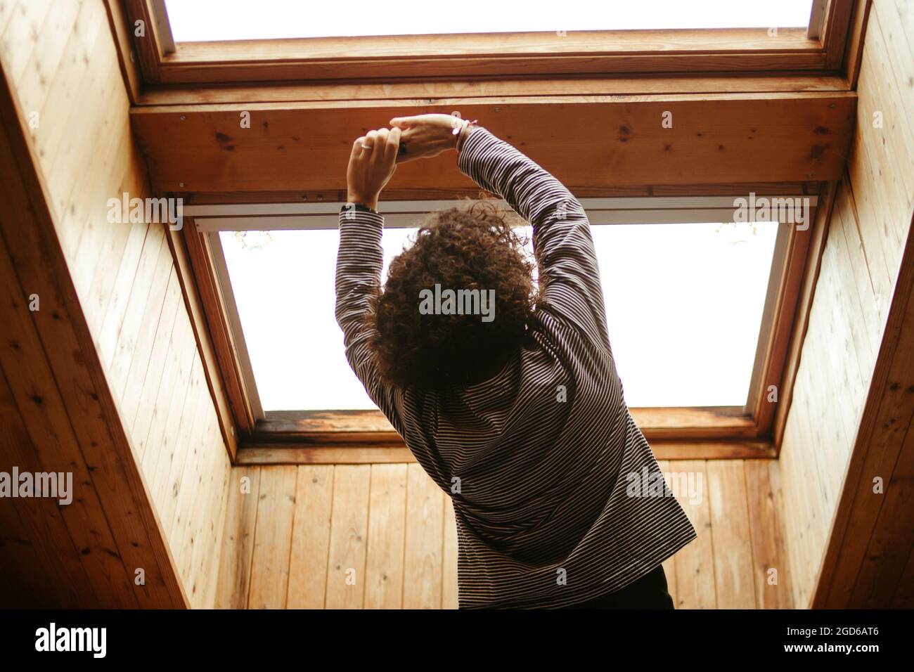 Female stretching arms out in hi-res stock photography and images - Alamy