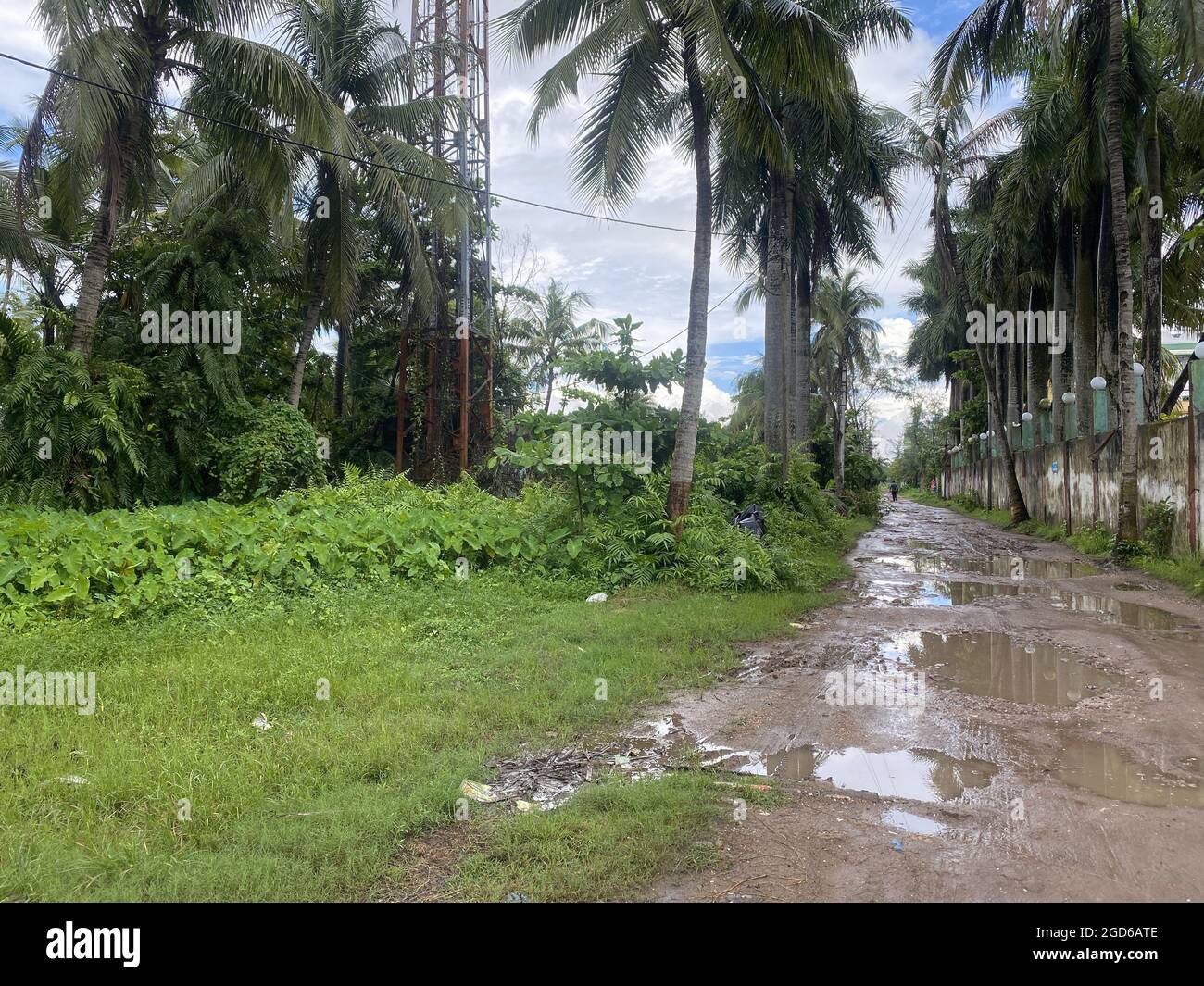 Damaged road to an Indian village after heavy rain Stock Photo - Alamy