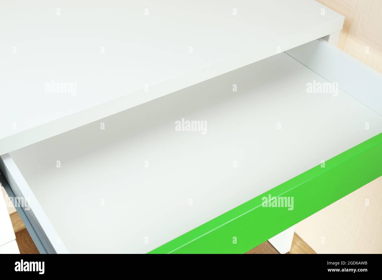 Table with opened empty drawer Stock Photo - Alamy