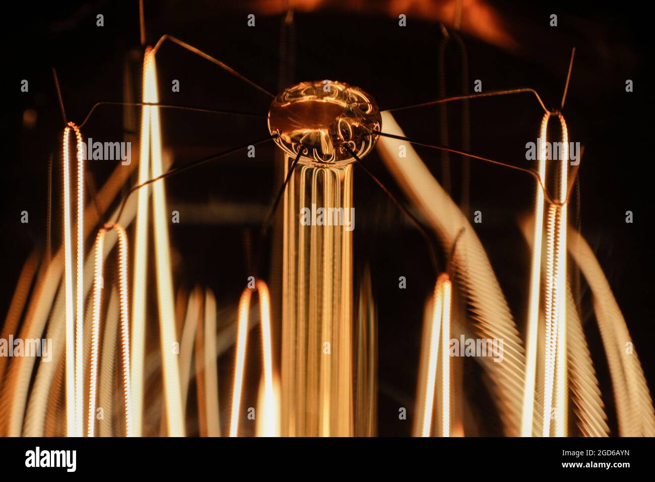 Closeup of the filament of the Edison bulb with a blurred background ...