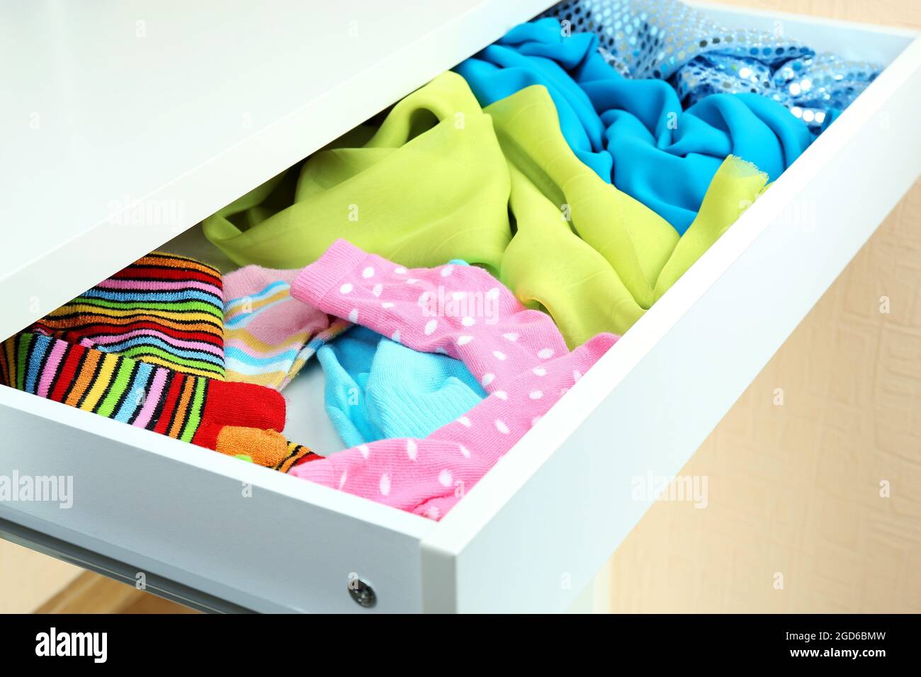 Open drawer with clothes close up Stock Photo - Alamy