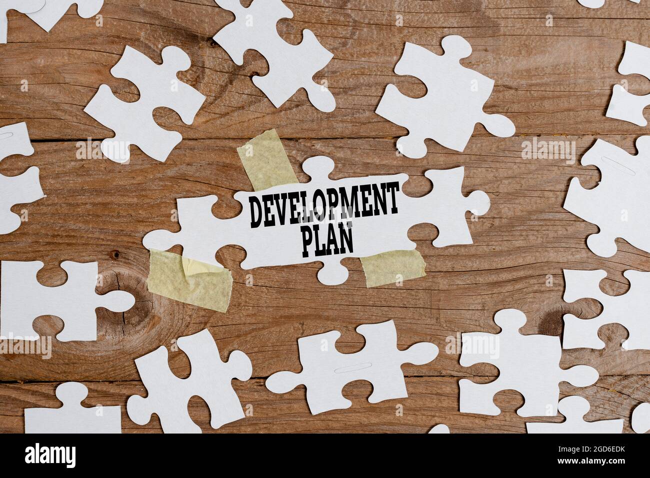 Sign displaying Development Plan. Word for the planning of the ...