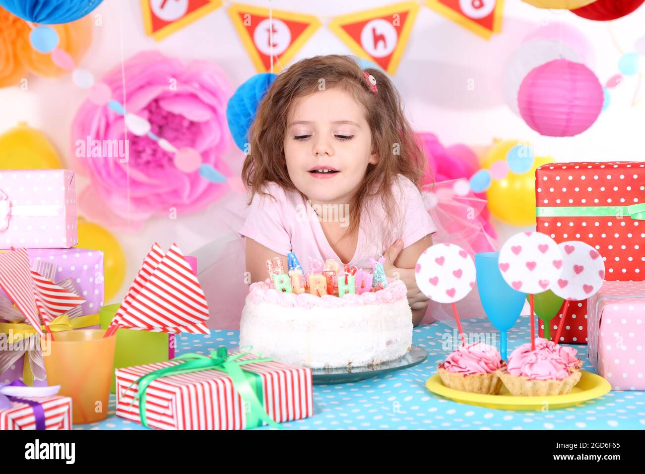 Pretty little girl celebrate her birthday Stock Photo - Alamy