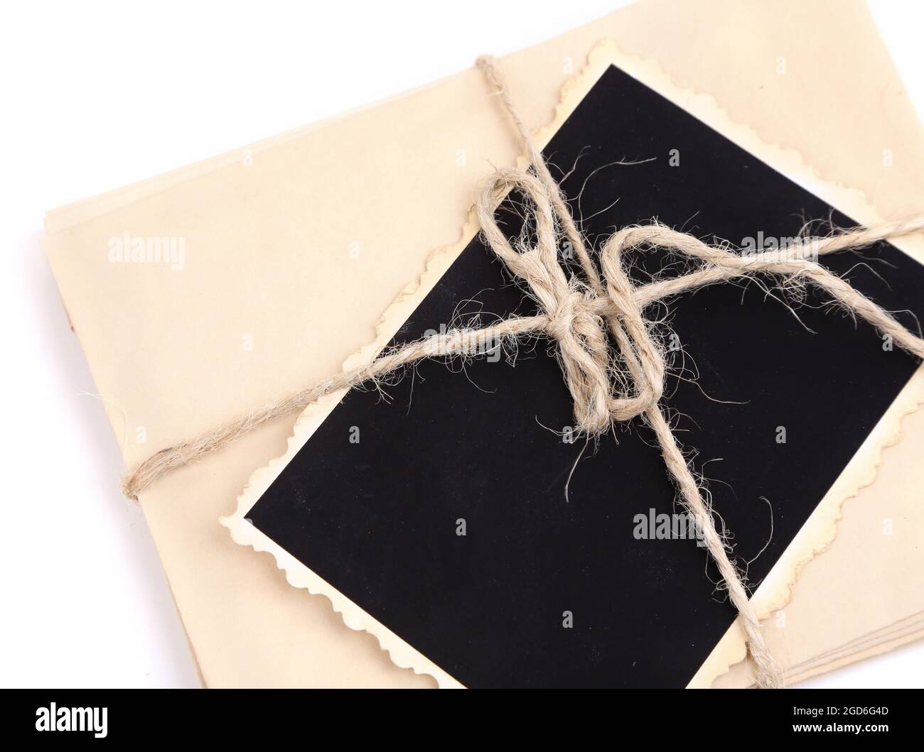Blank old photo, letters isolated on white Stock Photo - Alamy