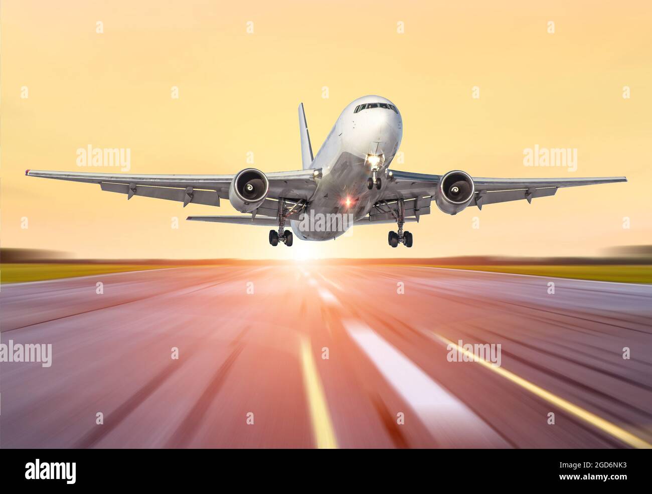 Big airplane in motion take off the evening sky sunset sunrise sun ...