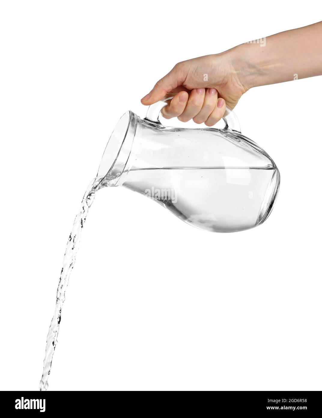 Pouring water from glass pitcher, isolated on white Stock Photo - Alamy